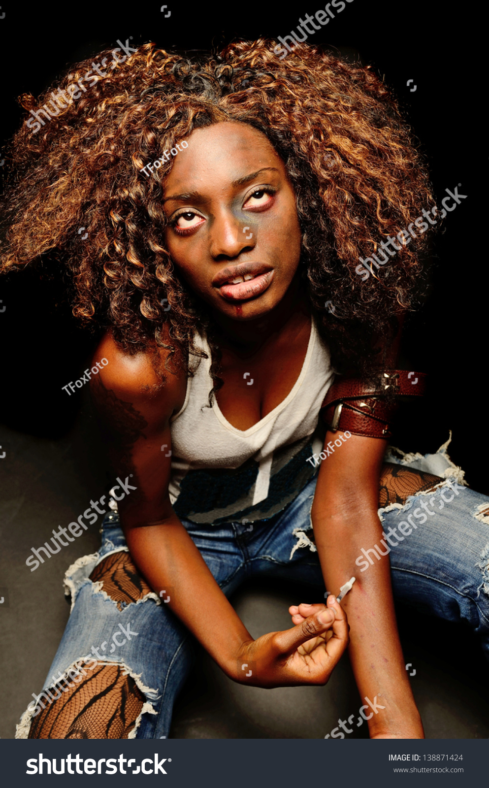 A Young Beautiful African American Female Poses As A Crack Whore Shooting Up Narcotics In This