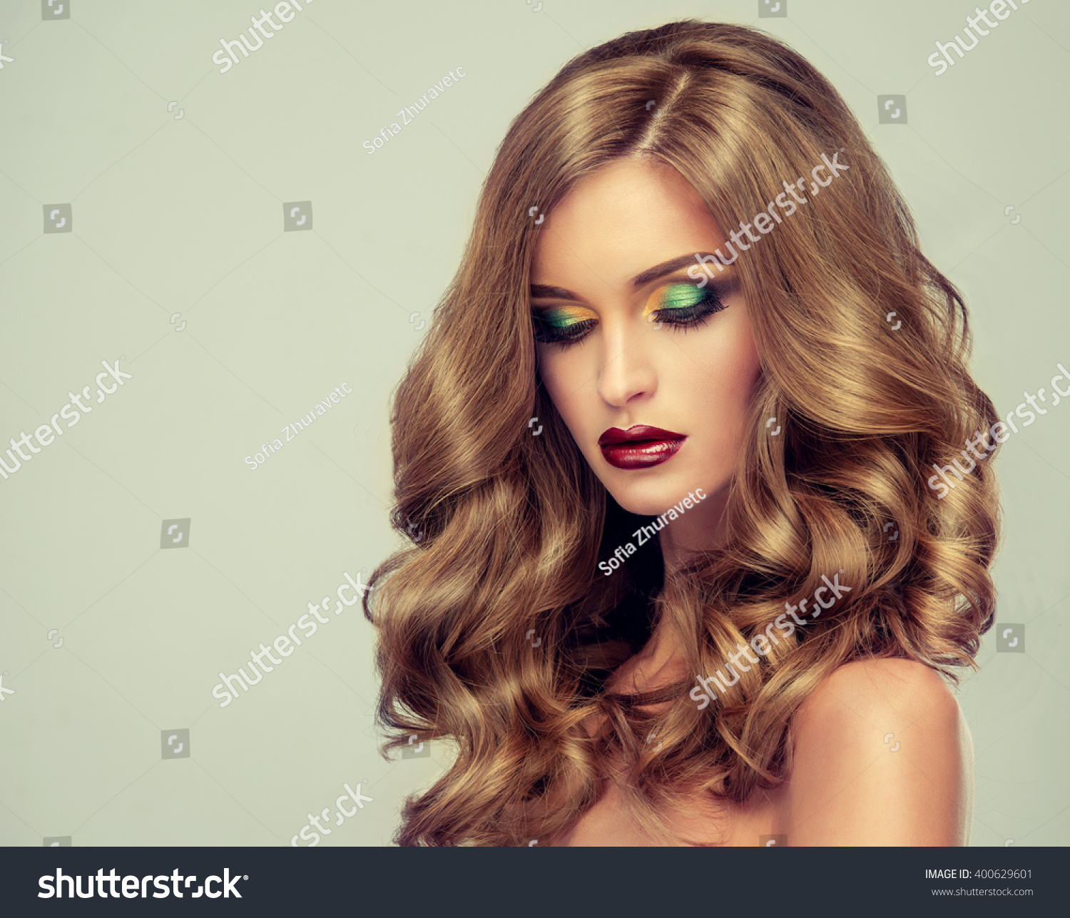 Beautiful Girl With Long Wavy Hair Fair Haired Model With Curly Hairstyle And Fashionable