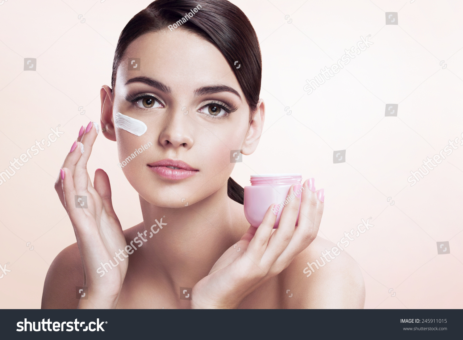 Beautiful Young Lady Applying Moisturizing Creme Skin Care Concept