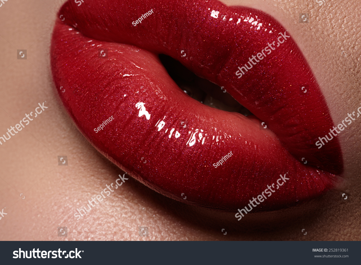 Close Up Of Womans Lips With Bright Fashion Red Glossy Makeup Macro Cherry Color Lipgloss Make