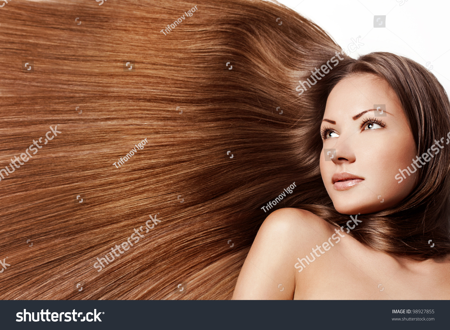 Closeup Portrait Of A Beautiful Young Woman With Elegant Long Shiny