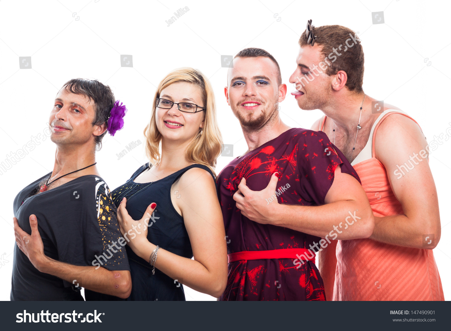 Group Of Bizarre Three Men Cross Dressing And One Woman Holding Breasts Isolated On White