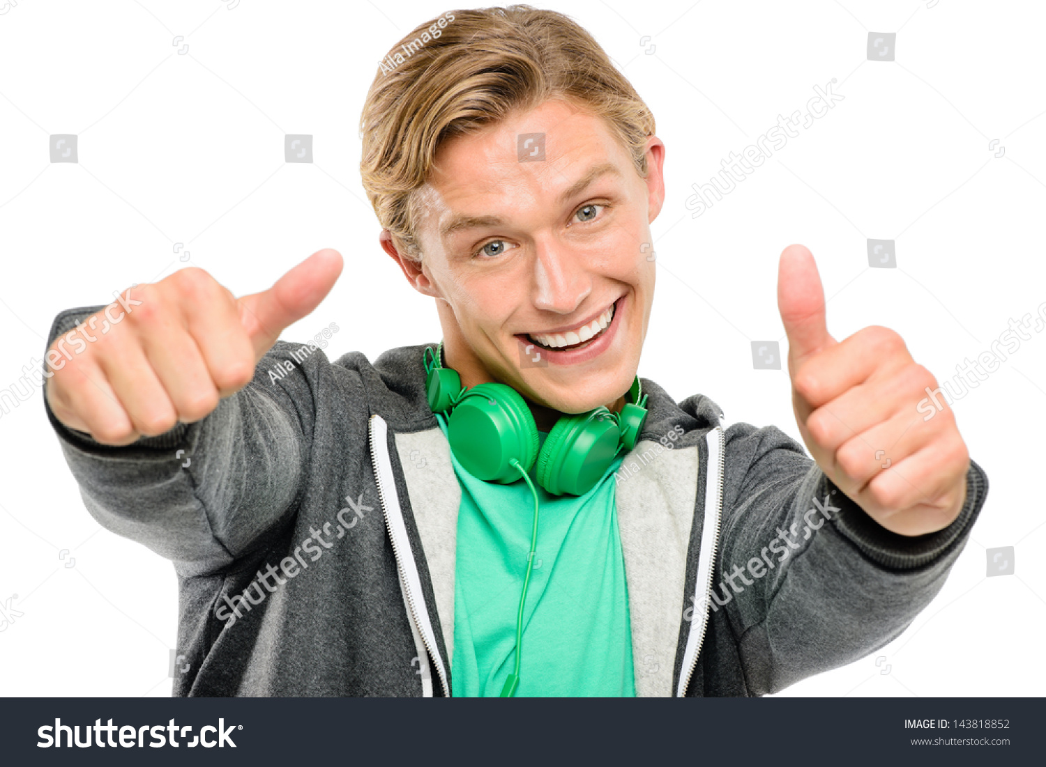 Happy Young Man Holding Thumbs Up Smiling Isolated On White Background
