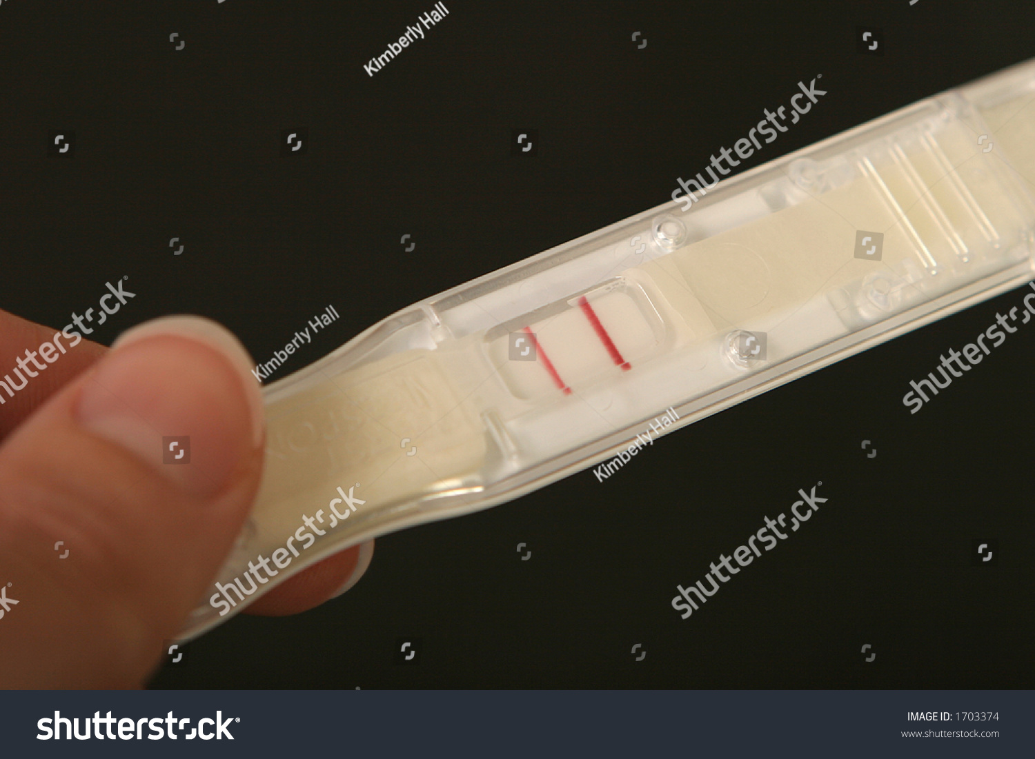 Positive Pregnancy Test. Stock Photo 1703374 : Shutterstock Positive Pregnancy Test. Stock Photo 1703374 : Shutterstock