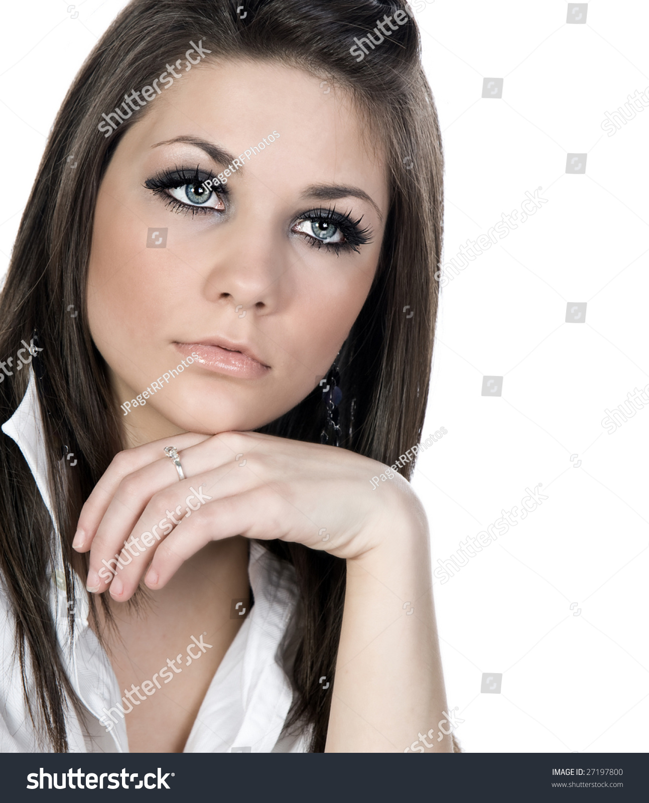 Shot Of A Beautiful Teenage Girl Resting Her Head On Her Hand Stock