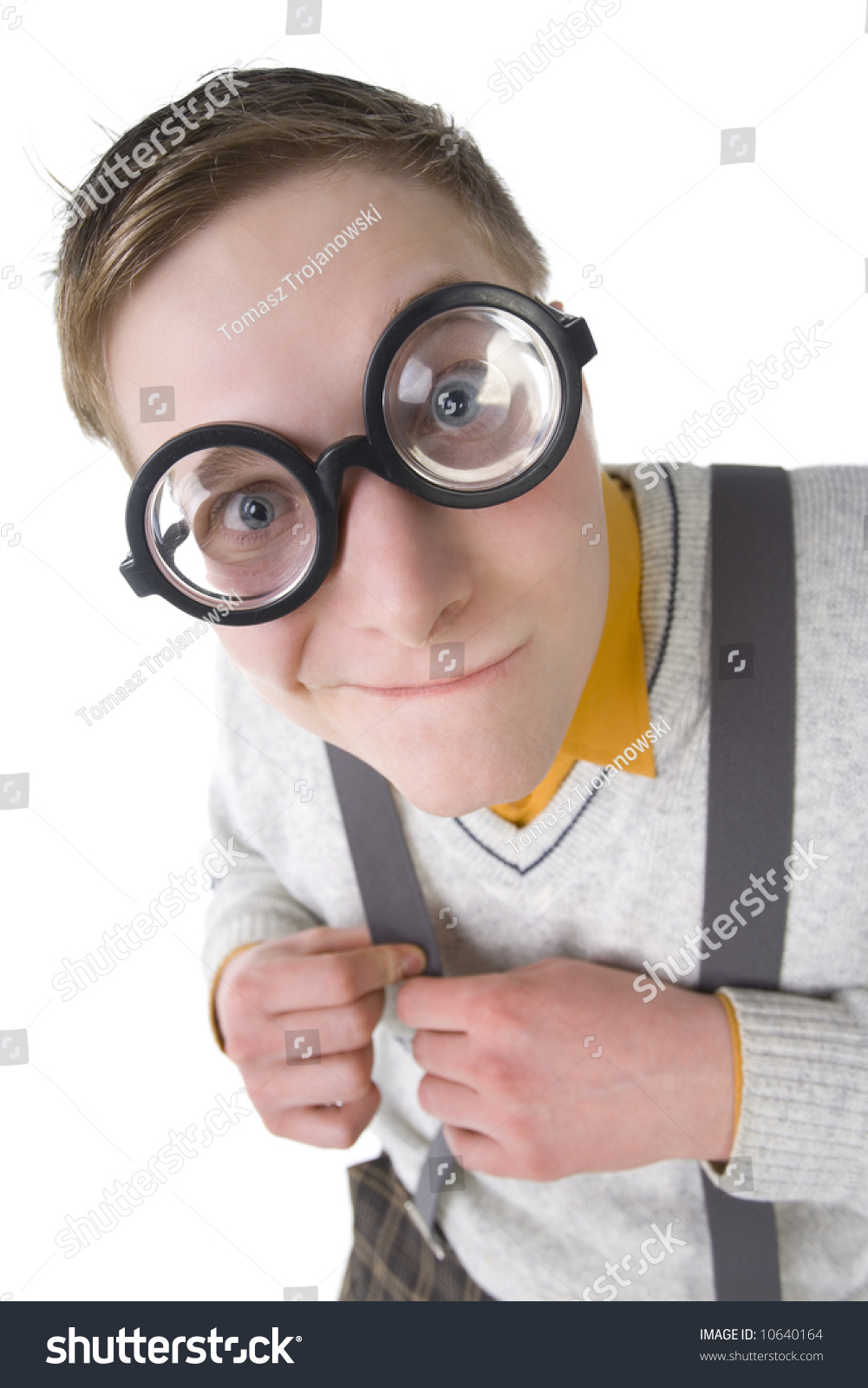 Shy Nerd In Funny Glasses Smiling And Looking At Camera Holding His Strap High Angle View