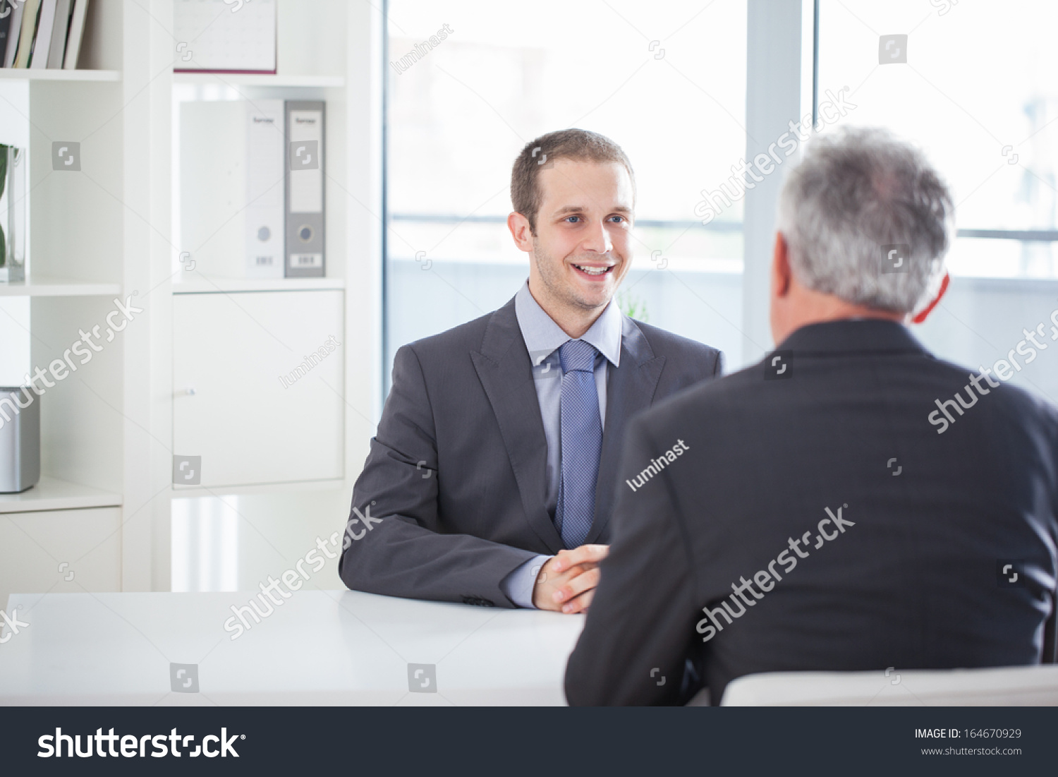 Smiling Candidate During Job Interview Stock Photo 164670929 - Shutterstock Smiling Candidate During Job Interview Stock Photo 164670929 - Shutterstock