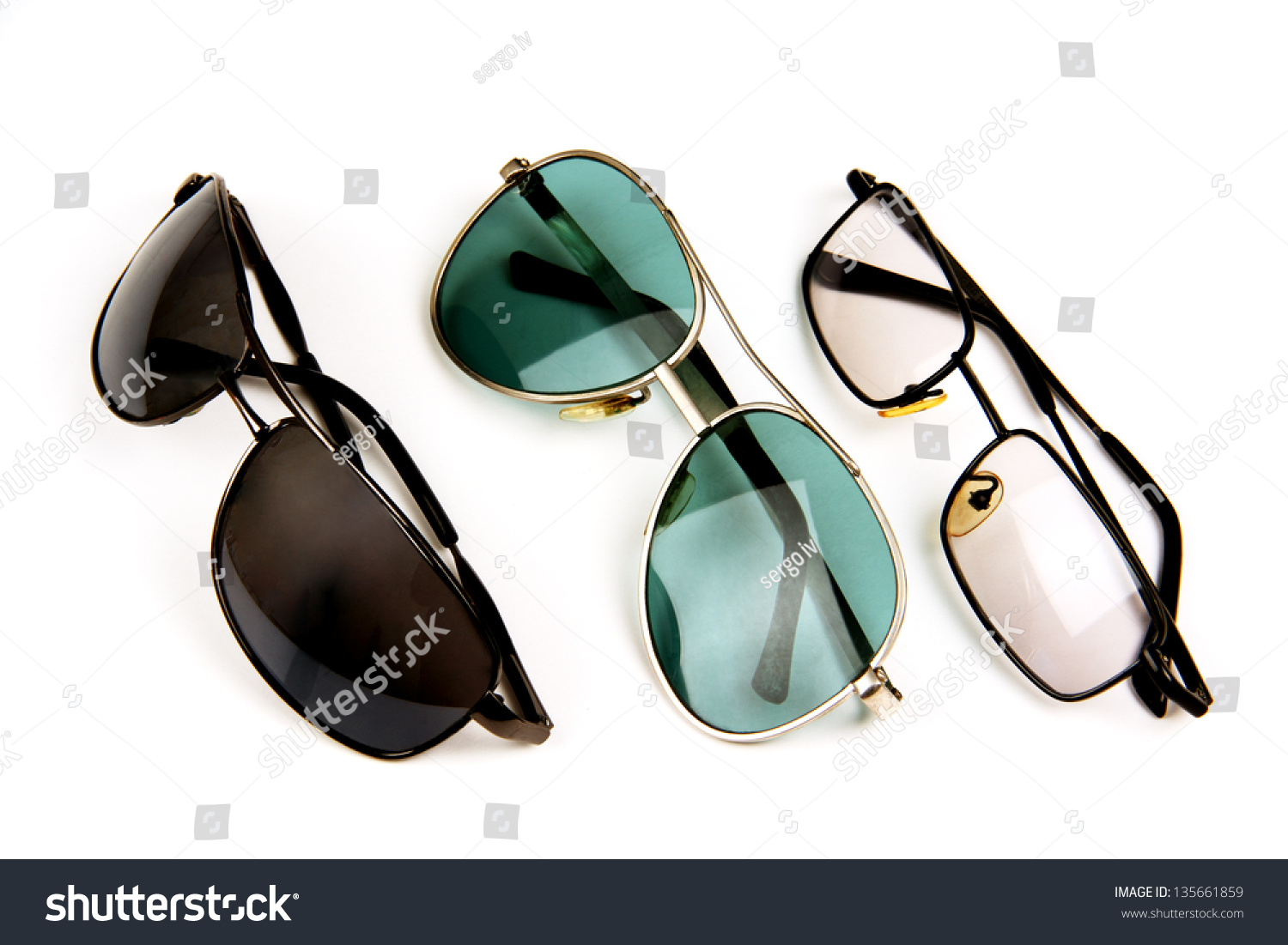 Three Pairs Of Glasses In Different Designs Photo On The White Background 135661859