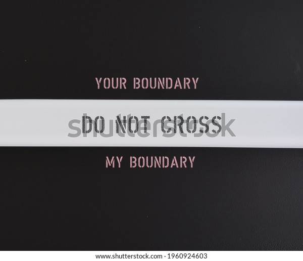 Black wall divided with border DO NOT CROSS MY BOUNDARY - YOUR BOUNDARY ...