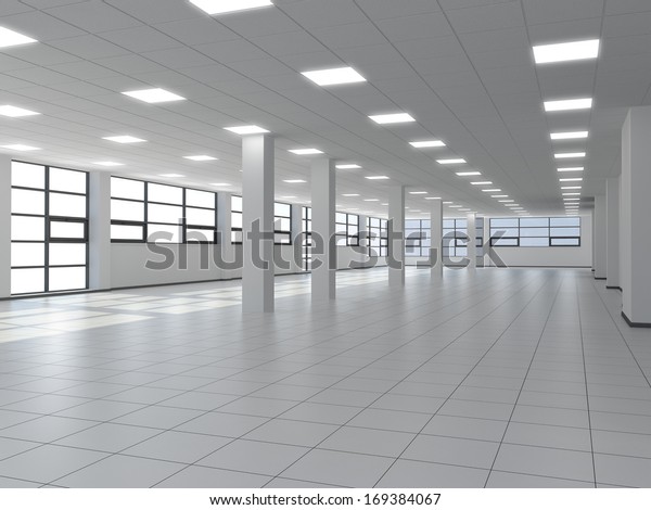 Empty office with white columns and large windows