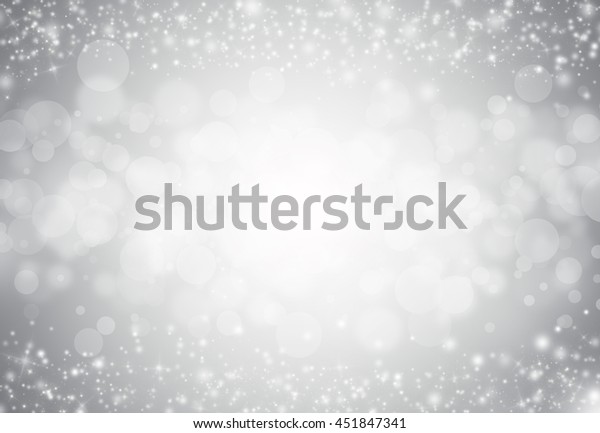 Grey glitter sparkles rays lights bokeh festive elegant abstract background.
