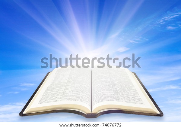 illustration of the opened Bible with sun rays