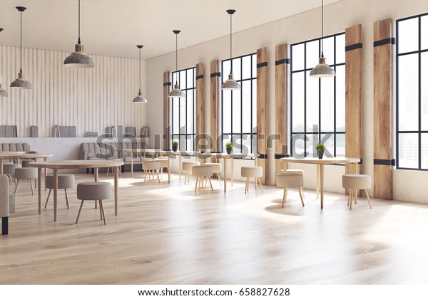 Side view of a modern cafe interior with concrete walls and floor ...