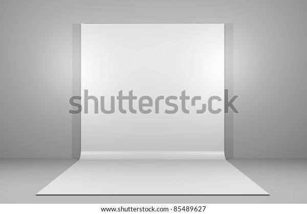 White backdrop in empty room with grey paint on wall