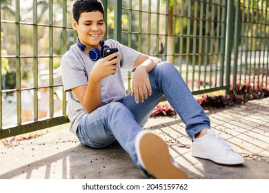 12 Years Old Boy Using Smartphone Stock Photo (Edit Now) 2045159762