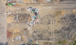 Factory industry with stack of different types of large garbage, an ...