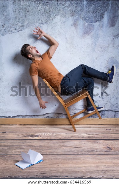 Afraid Young Man Falling Down Wooden Stock Photo (Edit Now) 634416569