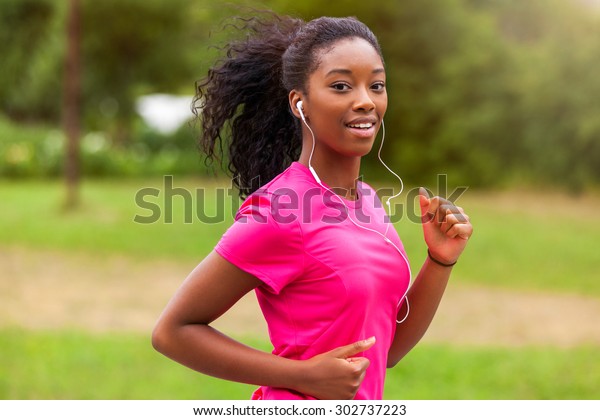 African American Woman Runner Jogging Outdoors Stock Photo 302737223 ... African American Woman Runner Jogging Outdoors Stock Photo 302737223 ...