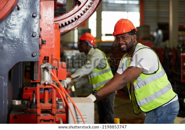 African Factory Workers Engineer Using Machine Stock Photo 2198853747 ...