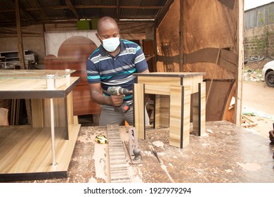 African Man Using Drill Machine Stock Photo 1927979294 | Shutterstock