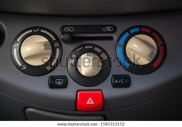 Air conditioning button inside a car. Climate control unit in the old ...