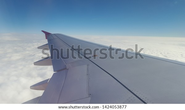 Airplane Window View Wing Flaps Stock Photo 1424053877 | Shutterstock