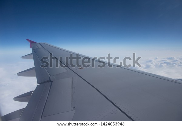Airplane Window View Wing Flaps Stock Photo 1424053946 | Shutterstock