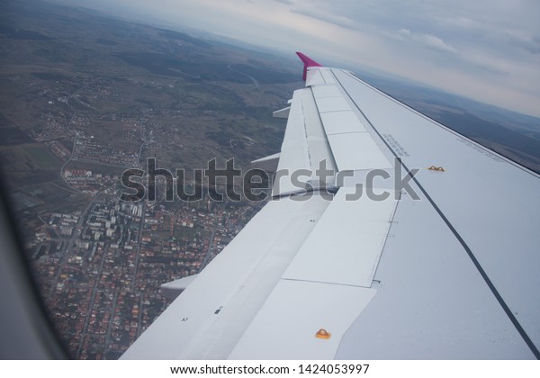 Airplane Window View Wing Flaps Stock Photo 1424053997 | Shutterstock