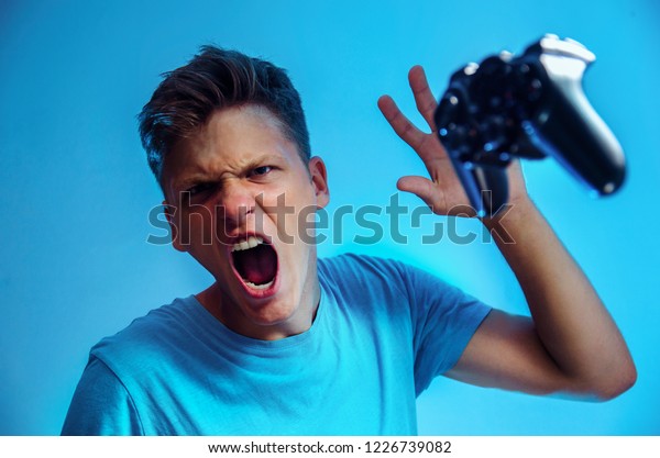 Angry Hyperactive Kid Throwing Game Pad Stock Photo 1226739082 ...