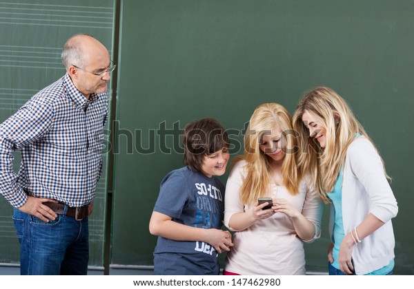 Angry Teacher Looking Students Using Mobilephone Stock Photo 147462980 ...