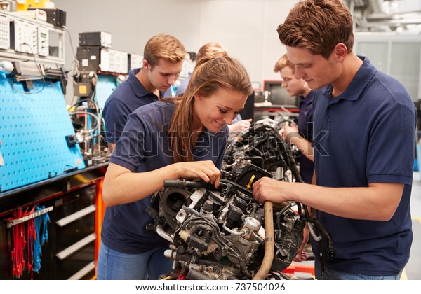 Apprentice Car Mechanics Working On Engine Stock Photo 737504026 ...