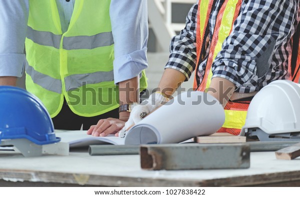 Architect Team Reading Construction Documents Outside Stock Photo (Edit ...
