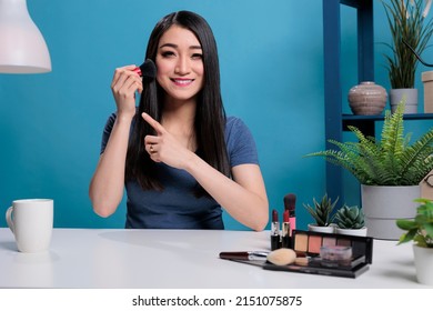 Asian Content Creator Using Brush While Stock Photo 2151075875 ...