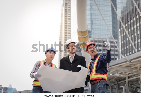 Asian Engineer Man Construction Workers Discussing Stock Photo ...