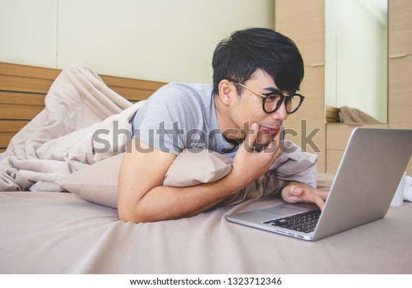 Asian Man Looking Computer Screen Surprised Stock Photo 1323712346 ...