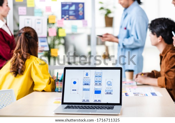 Asian Ux Developer Ui Designer Presenting Stock Photo 1716711325 ... Asian Ux Developer Ui Designer Presenting Stock Photo 1716711325 ...