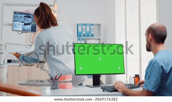 Assistant Using Horizontal Green Screen On Stock Photo 2069176382 ...