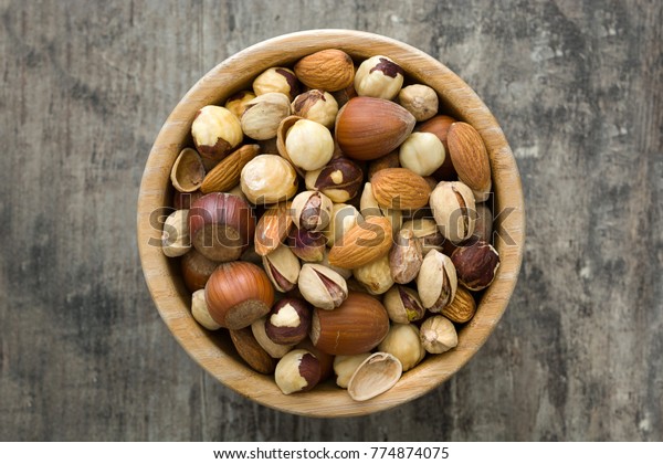 Assorted Mixed Nuts Bowl On Wooden Stock Photo (Edit Now) 774874075