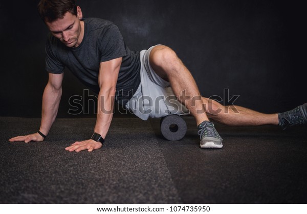 Athletic Man Using Foam Roller Relieve Stock Photo 1074735950 ...