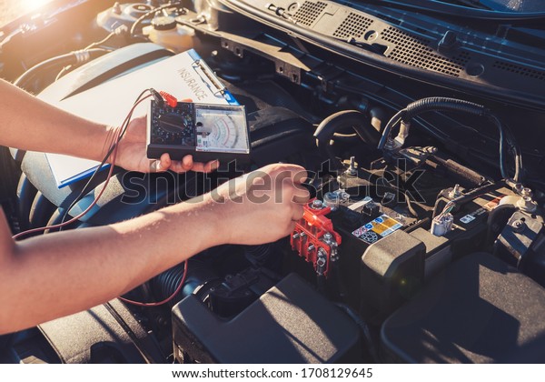Auto Mechanic Checking Test Cca Battery Stock Photo (Edit Now) 1708129645