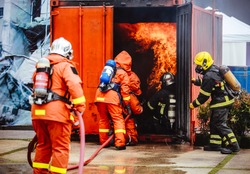 Group of firemen fighting with fire, a Person Photo by art PVP - market