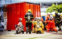 Group of firemen fighting with fire, a Person Photo by art PVP - market