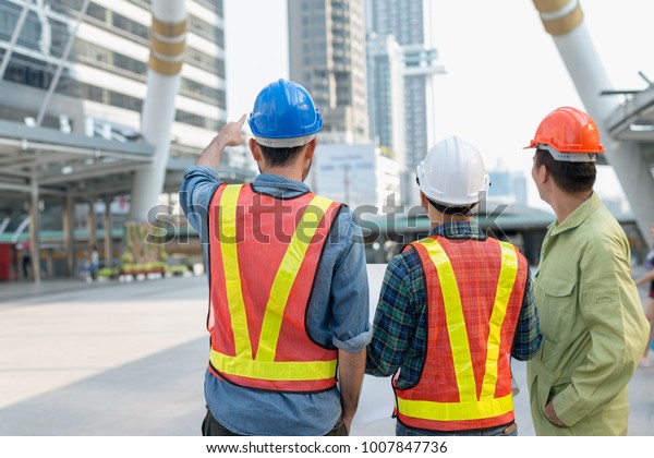 Back View Group Engineer Worker Checking Stock Photo (Edit Now) 1007847736