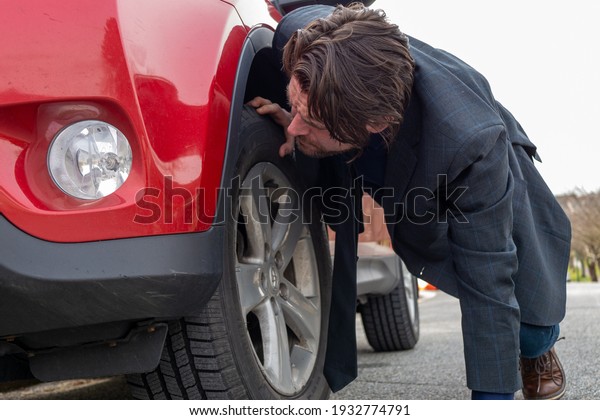 Back View Man Crouching Down Looking Stock Photo 1932774791 | Shutterstock