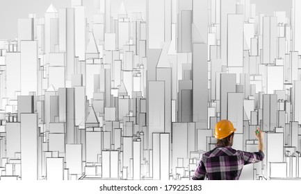 Back View Man Engineer Drawing Buildings Stock Photo (Edit Now) 179225183