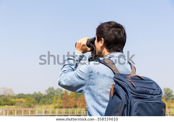 Back View Man Looking Though Binocular Stock Photo 358159610 | Shutterstock