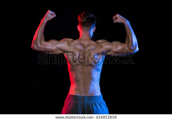 Back View Shirtless Bodybuilder Gesturing Isolated Stock Photo ...