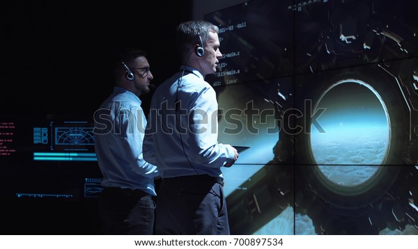 Back View Two Supervisors Standing Screen Stock Photo 700897534 ...