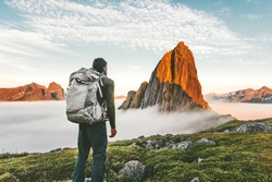 Adventurous man hiking in mountains, a Sports & Recreation Photo by e v ...