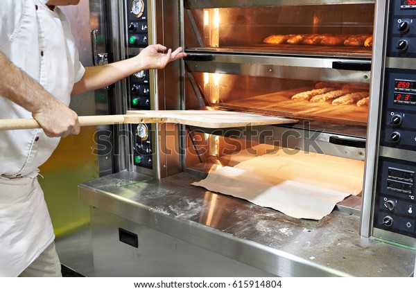 Baker Bakes Bread Oven Stock Photo (Edit Now) 615914804